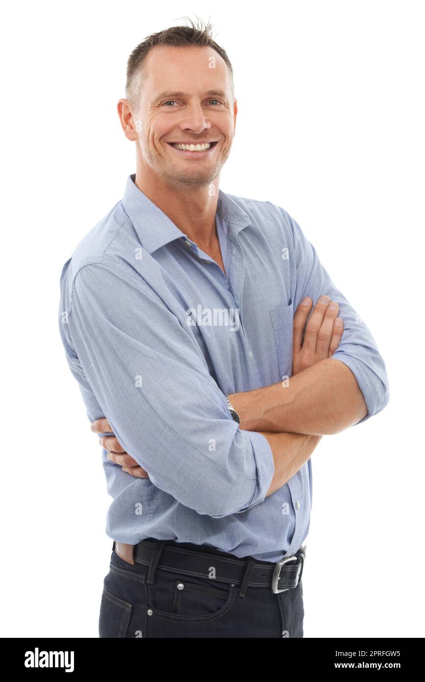 Mature masculinity. A handsome mature man smiling at the camera against ...