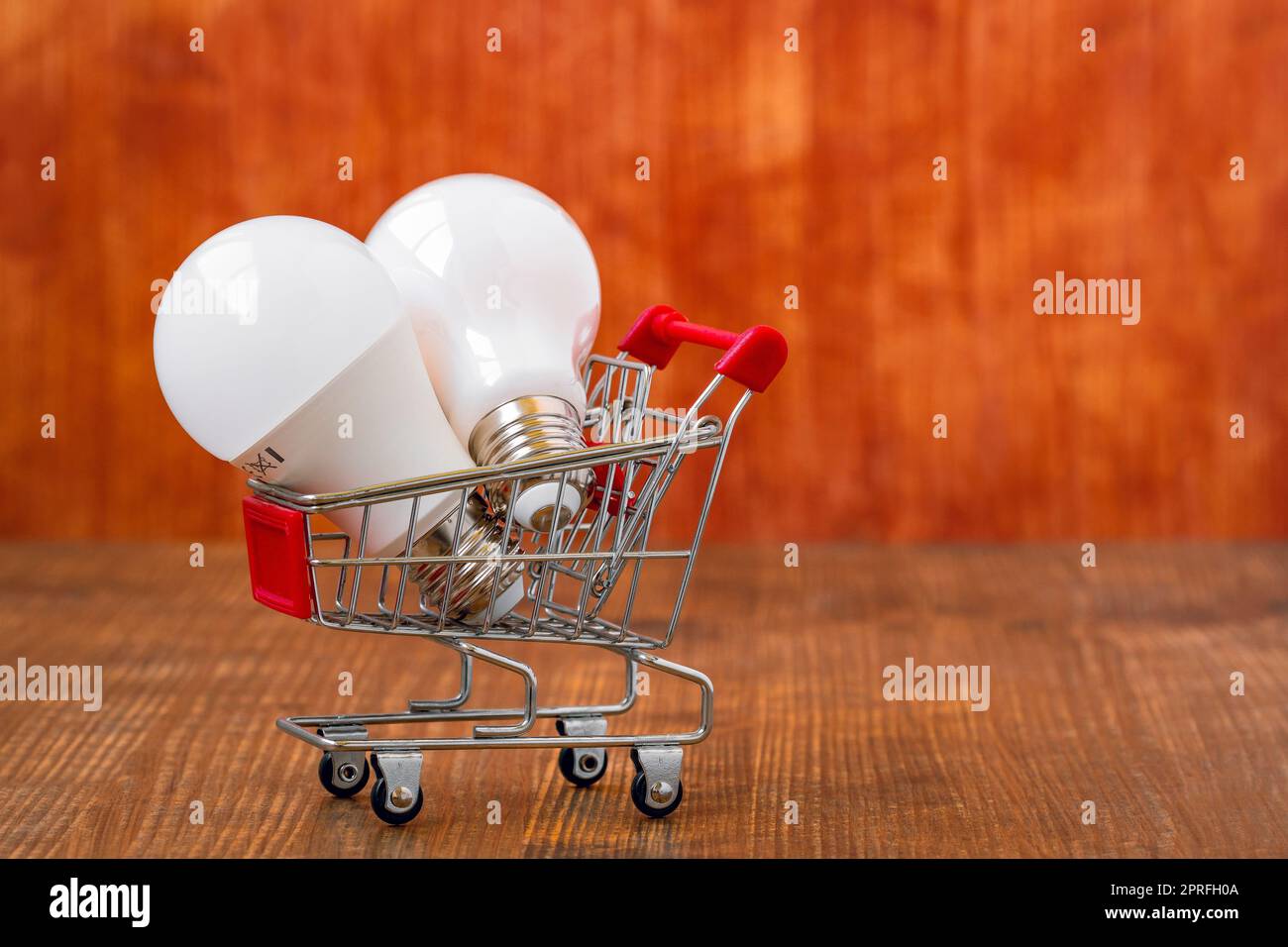 Shopping Cart with set of LED bulbs Stock Photo - Alamy