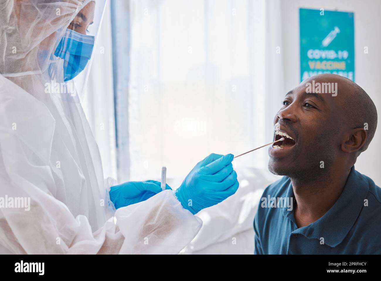 Doctor, healthcare and covid test using swab in mouth of a patient to ...