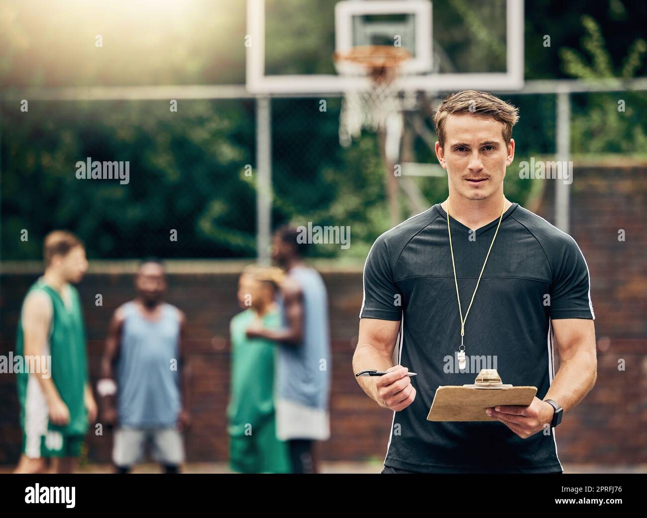 Basketball coach on court training team for game, tournament and ...