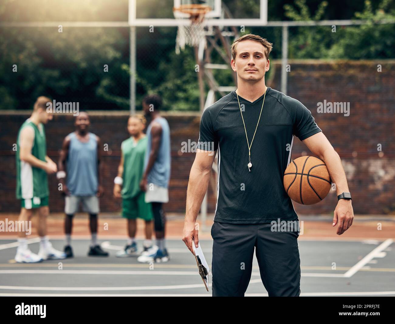 Coach, man and basketball portrait on court training for match, game or ...