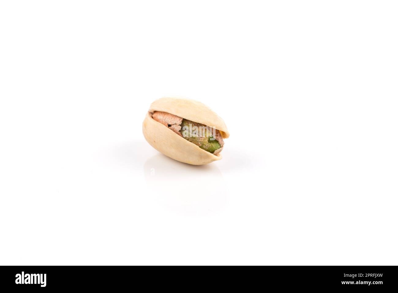 pistachio nut in shell close up isolated on white background Stock ...