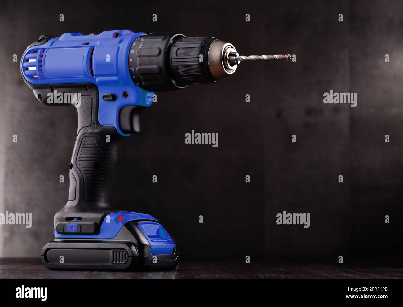 Cordless drill with drill bit working also as screw gun Stock Photo - Alamy