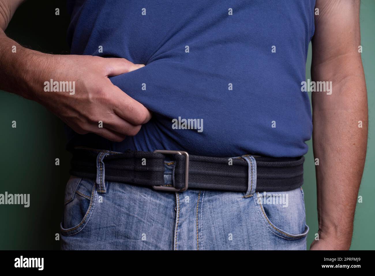 Full fat male belly hi-res stock photography and images - Alamy