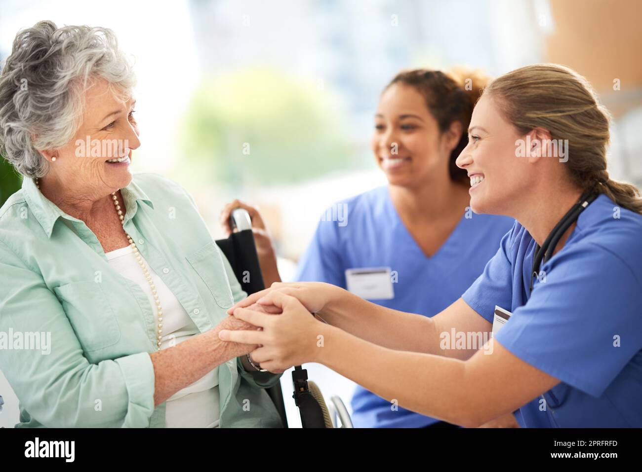 Elderly woman wheelchair two nurses hi-res stock photography and images ...