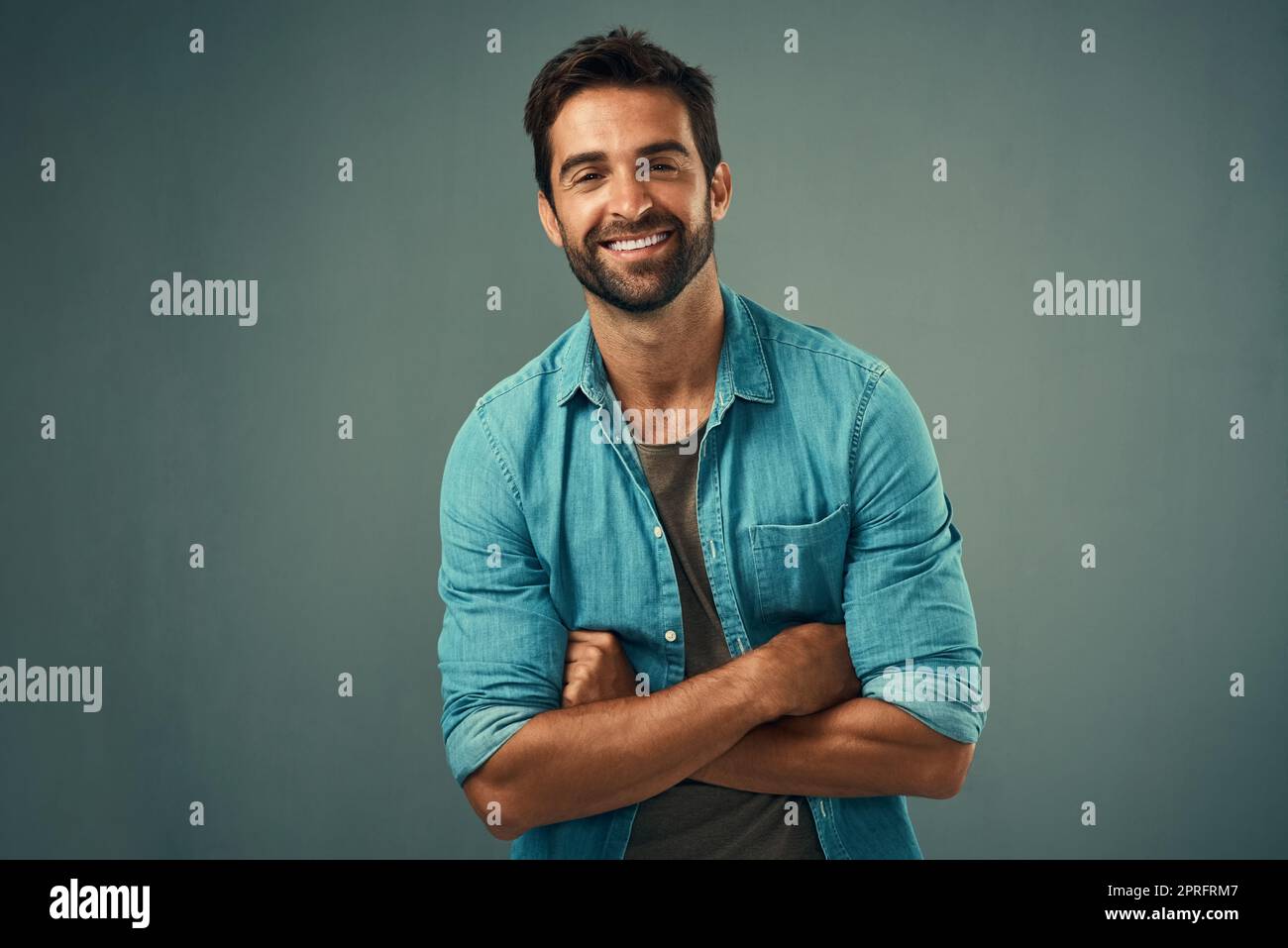 Hes a happy-go-lucky type of guy. Studio portrait of a handsome young ...