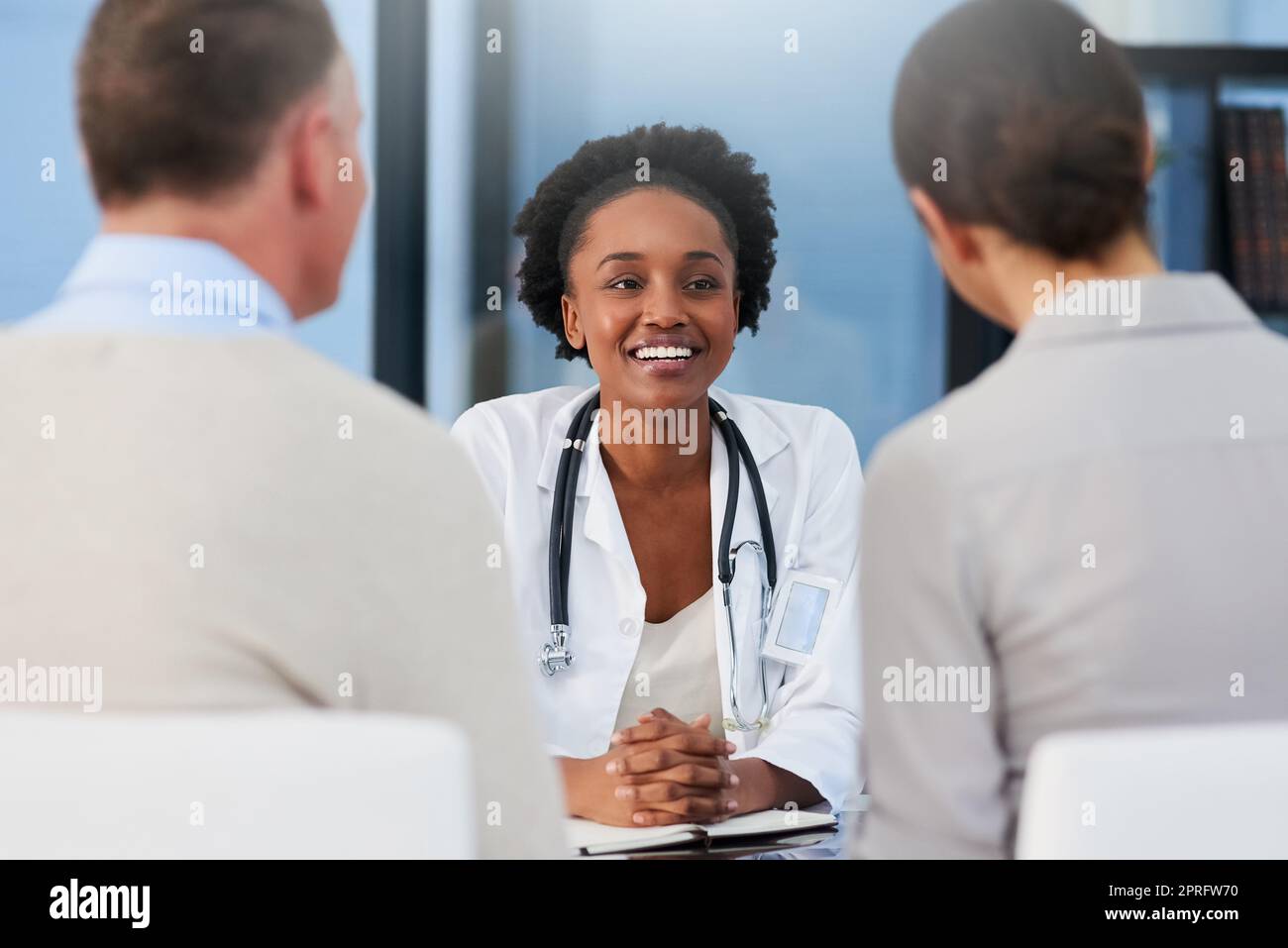 What can I do for you today. a female doctor talking to a married ...
