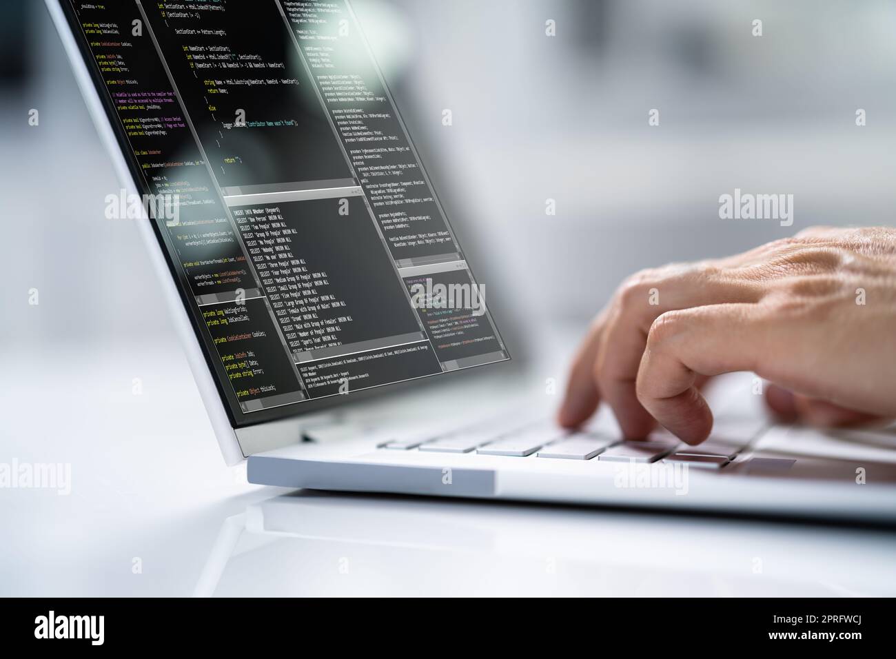 Guy back working laptop chair hi-res stock photography and images - Alamy