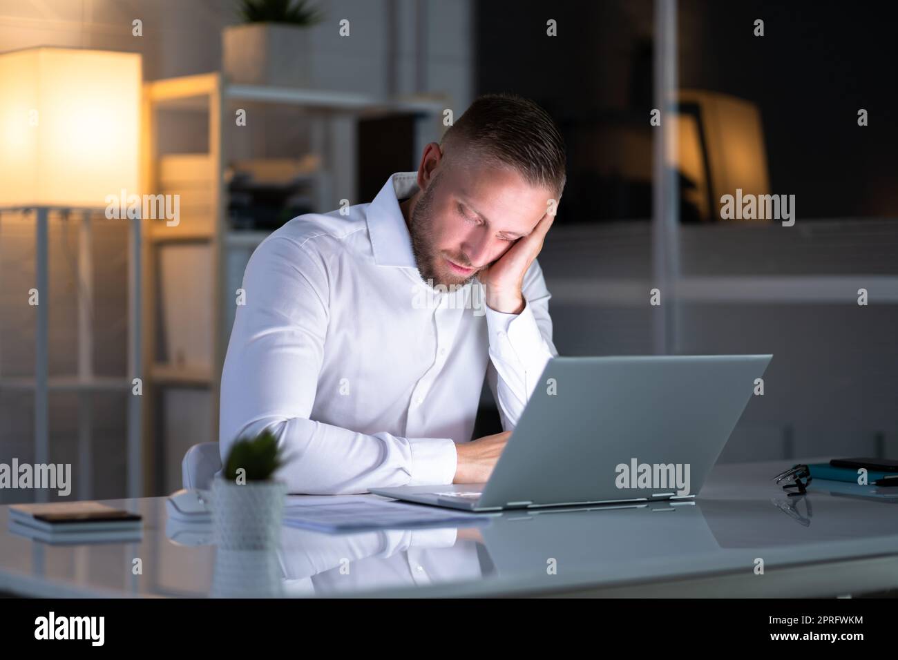 Bored Boss Man Sleeping Stock Photo - Alamy