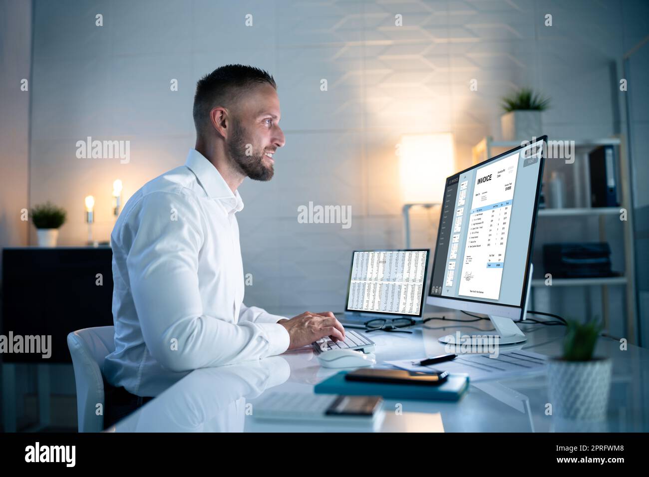 Working at desktop computer hi-res stock photography and images - Alamy
