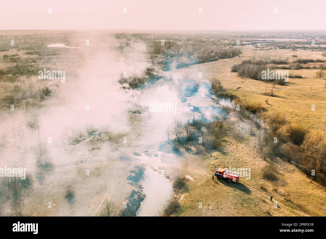 Aerial View. Spring Dry Grass Burns During Drought Hot Weather. Bush ...