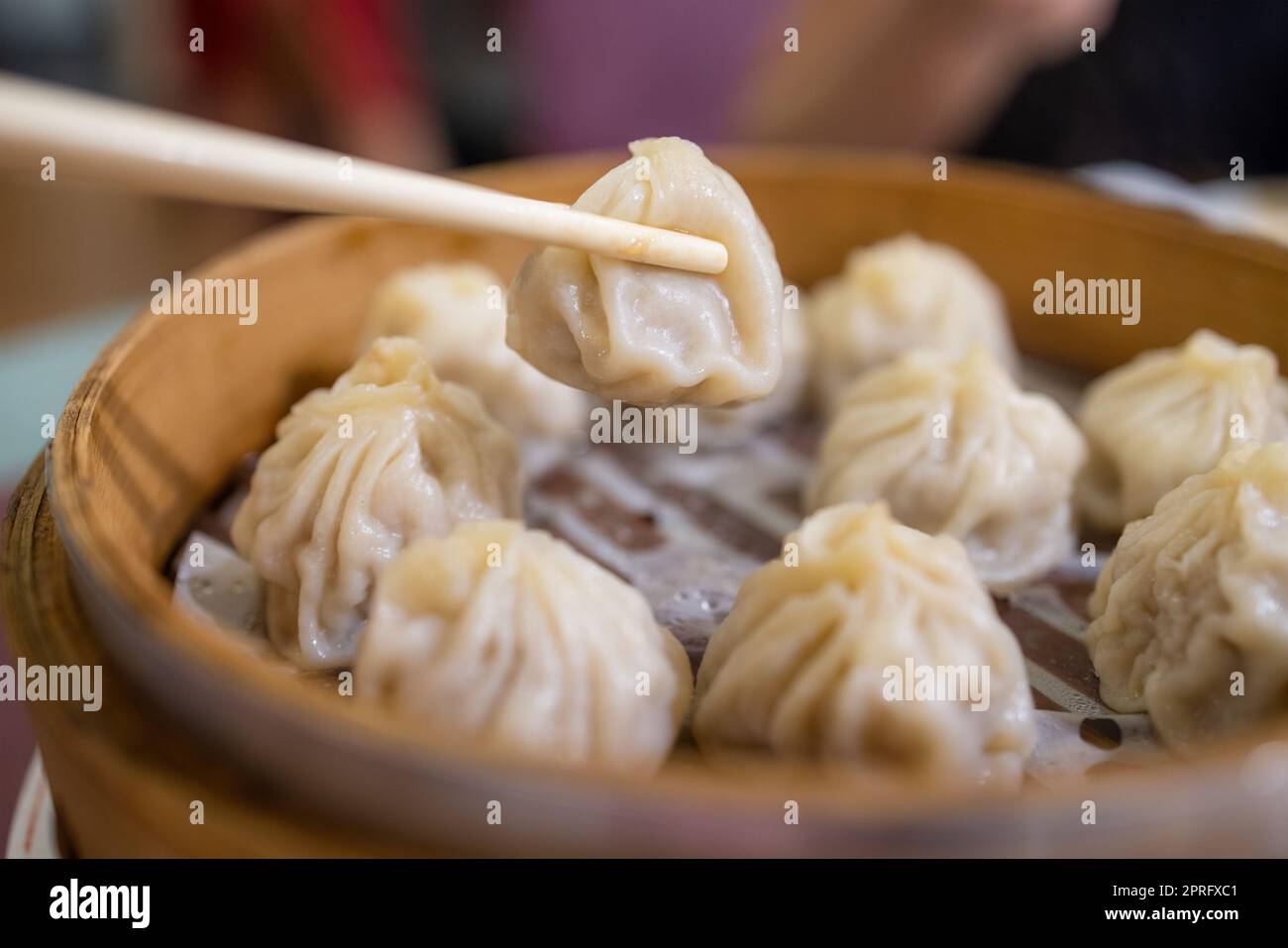 Chinese style steamed soup bun in restaurant Stock Photo - Alamy