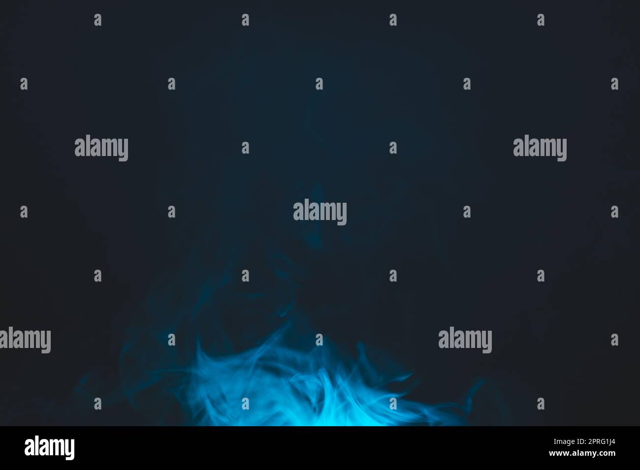 Blue smoke clouds in the dark abstract background. fog floating in air ...