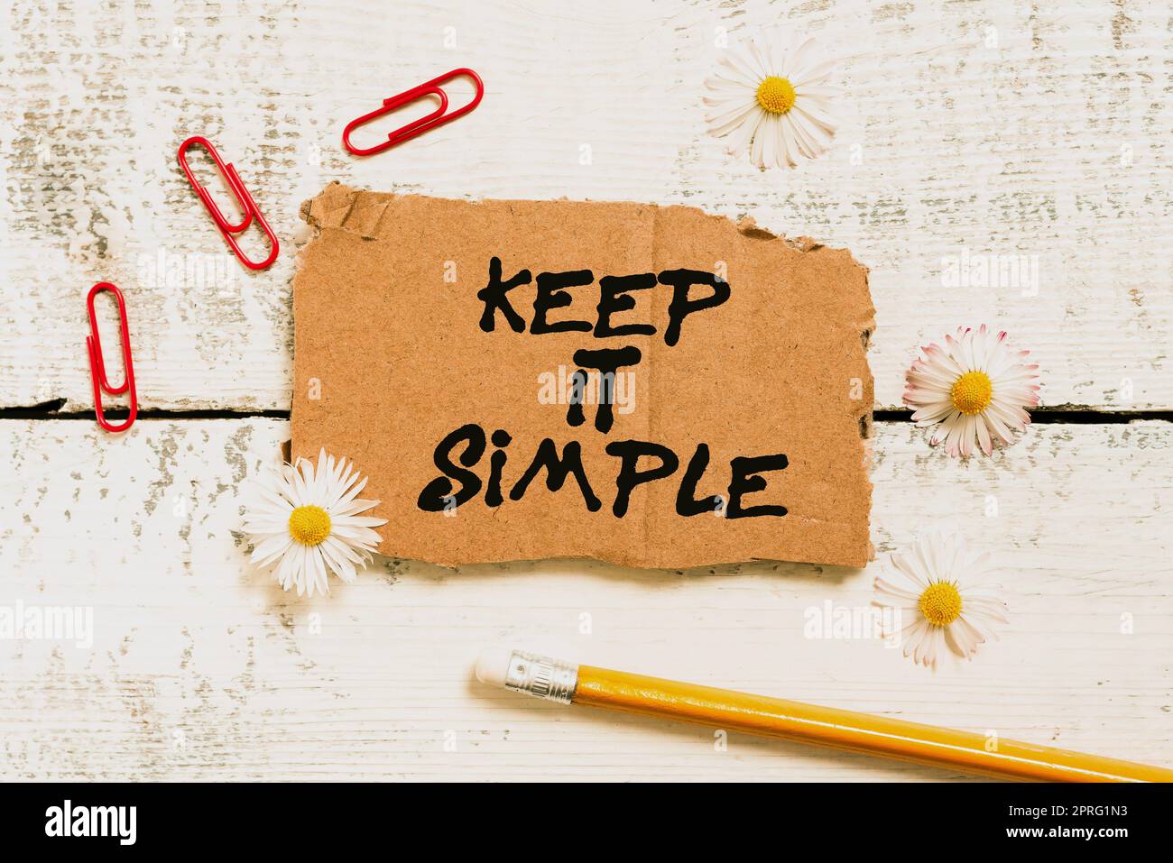 Hand writing sign Keep It Simple. Conceptual photo Easy to toss around ...