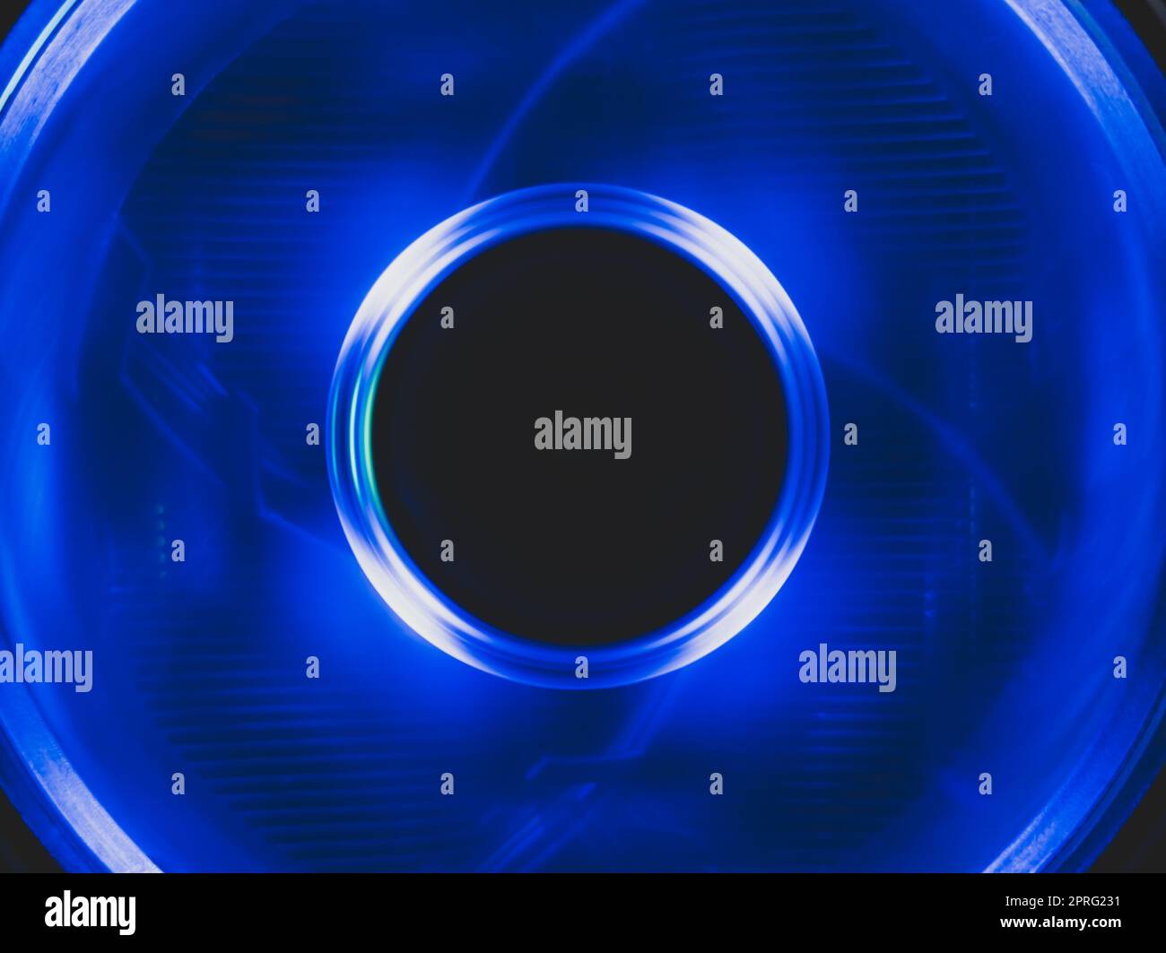 Computer cooling fan with blue light abstract background. cooler in ...