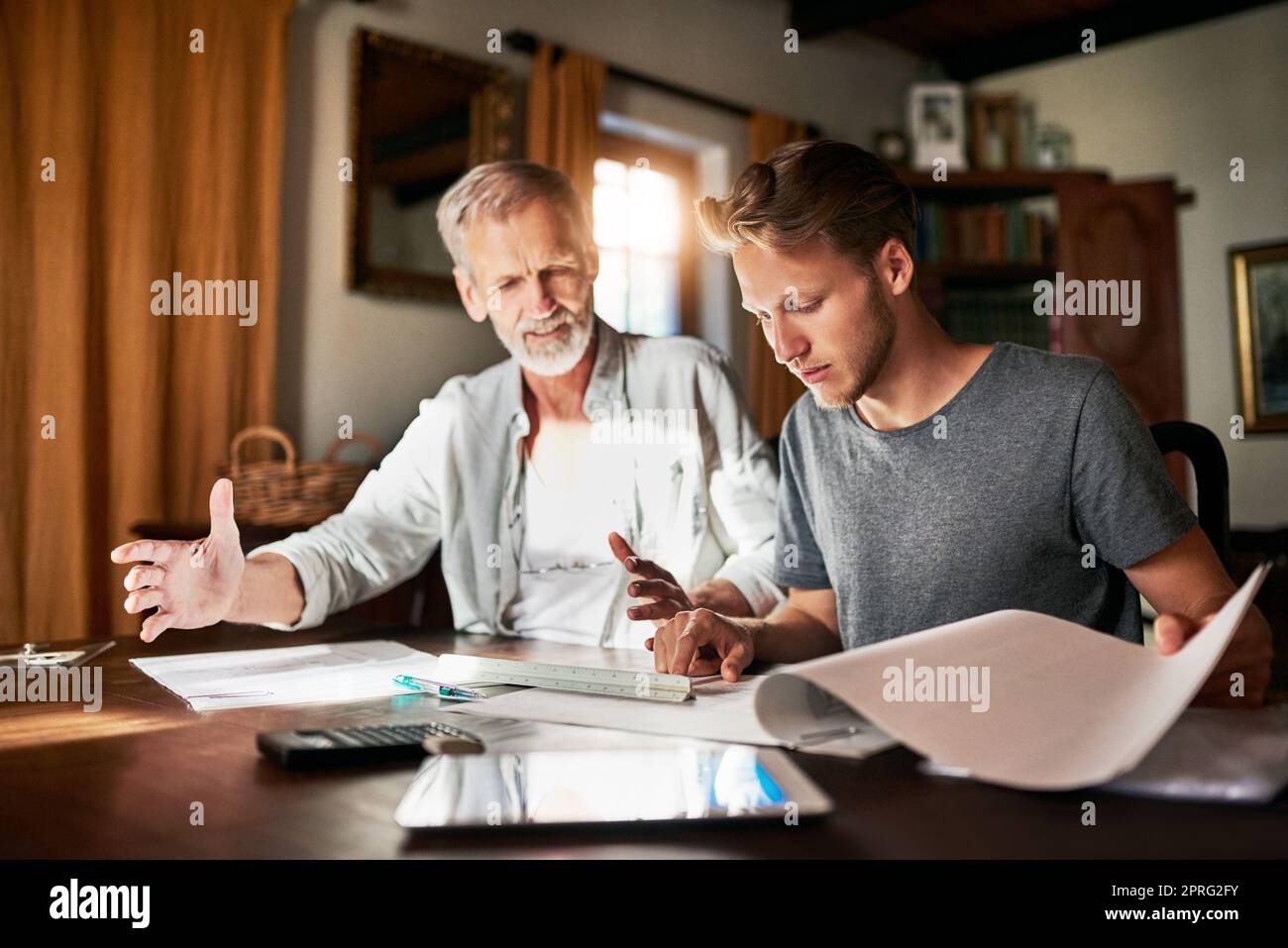 Men working together hi-res stock photography and images - Alamy