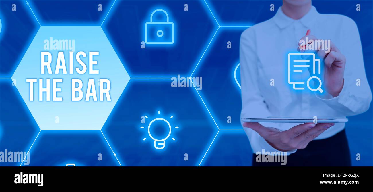 Conceptual caption Raise The Bar. Word Written on Set higher standards ...