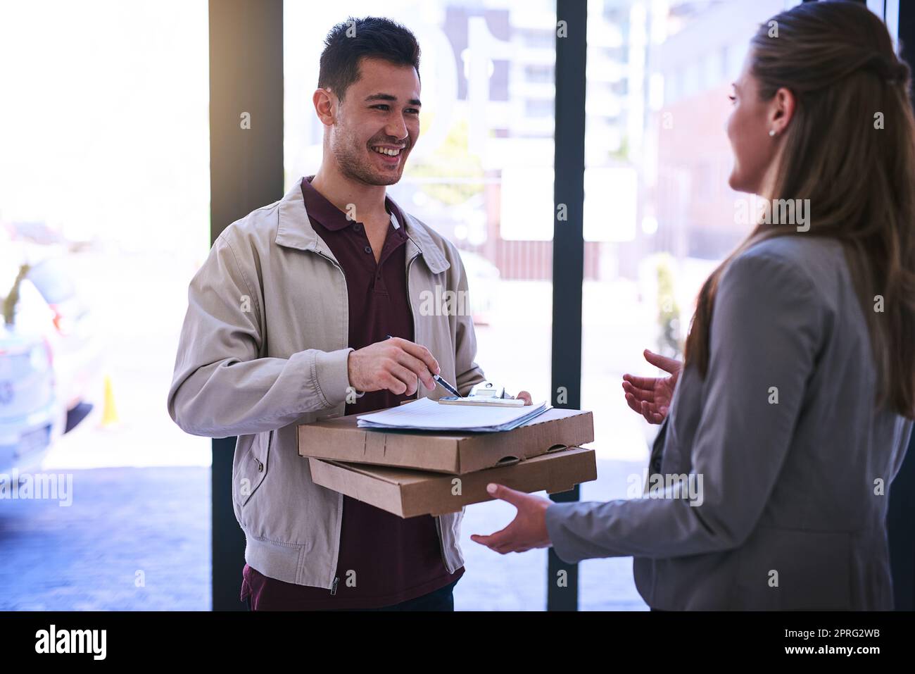 Delivery man at door hi-res stock photography and images - Alamy