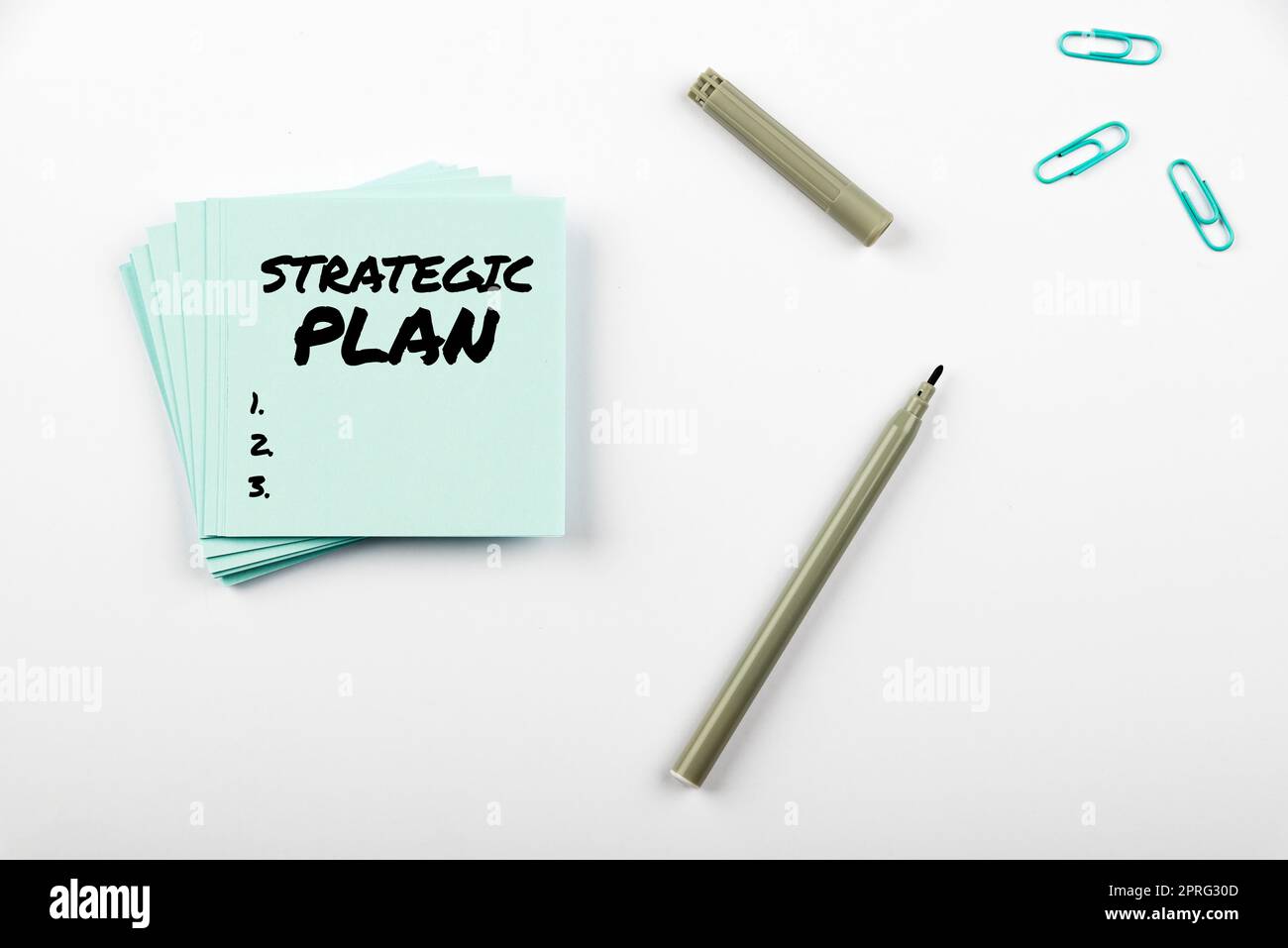 Sign displaying Strategic PlanA process of defining strategy and making ...