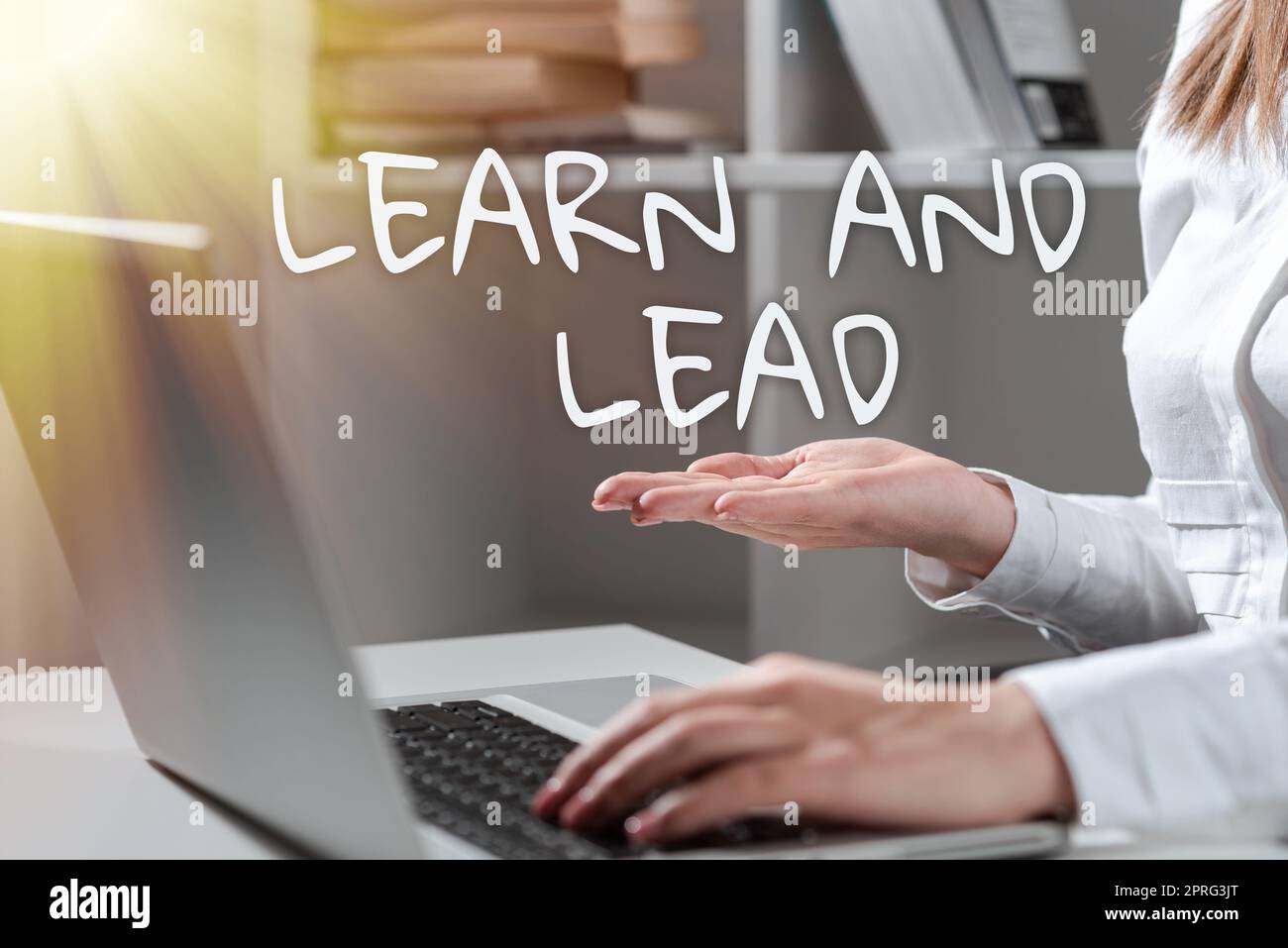 Text sign showing Learn And Lead. Business idea Improve the skills and knowledge to fit for the ...