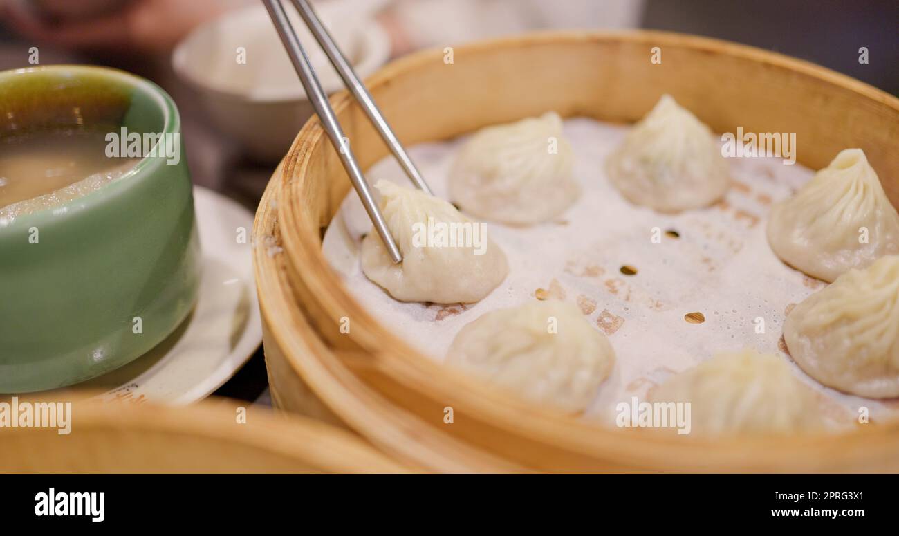 Chinese style steamed soup bun in restaurant Stock Photo - Alamy