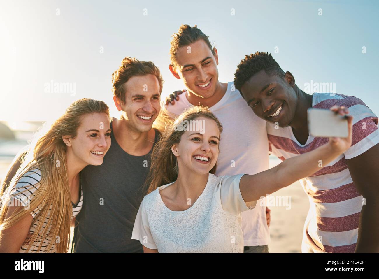 The Season For Selfies A Happy Group Of Friends Taking Selfies