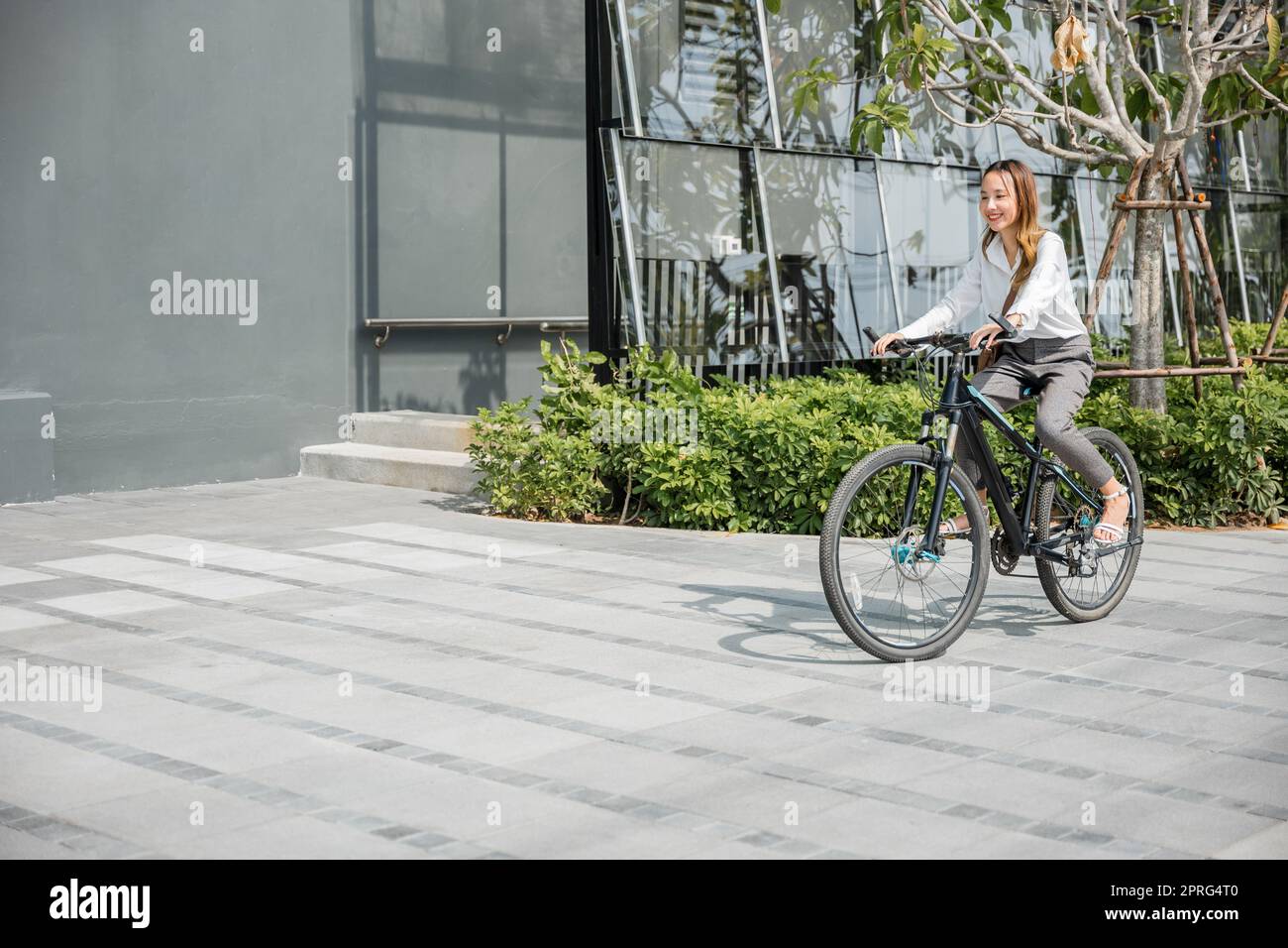 Person riding bike helmet hi-res stock photography and images - Alamy