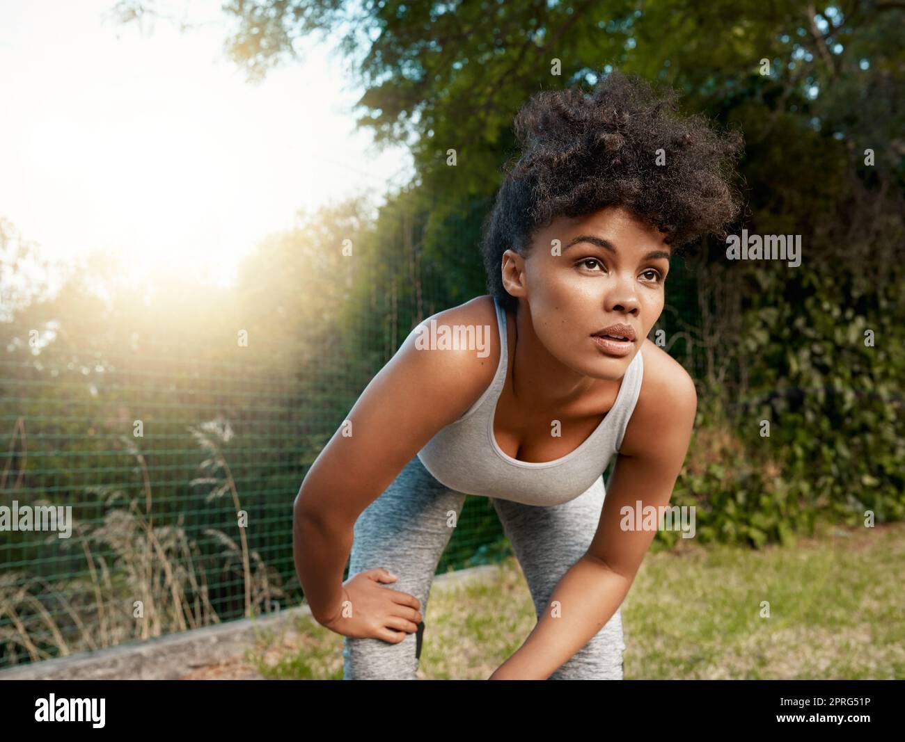Starting anything is the beginning. a sporty young woman taking a break ...