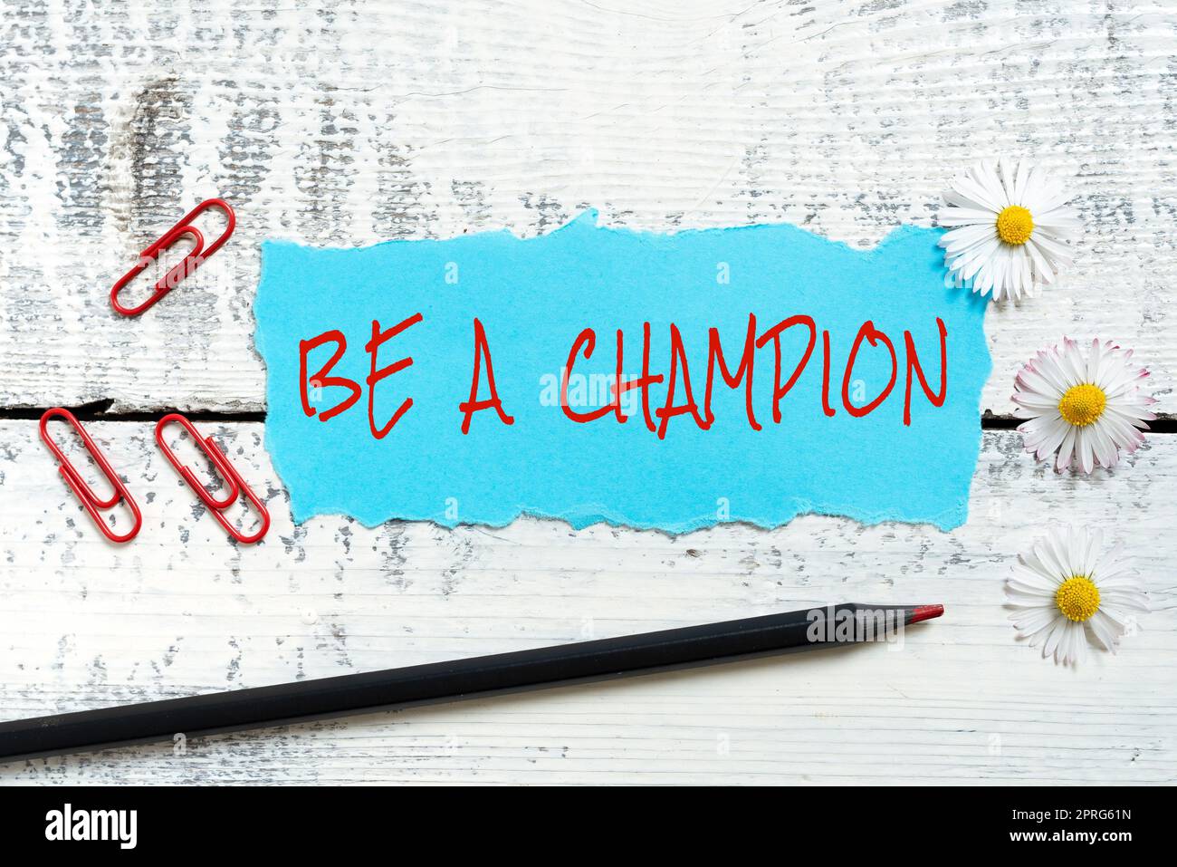 Text caption presenting Be A Champion. Word Written on Triumph in a ...