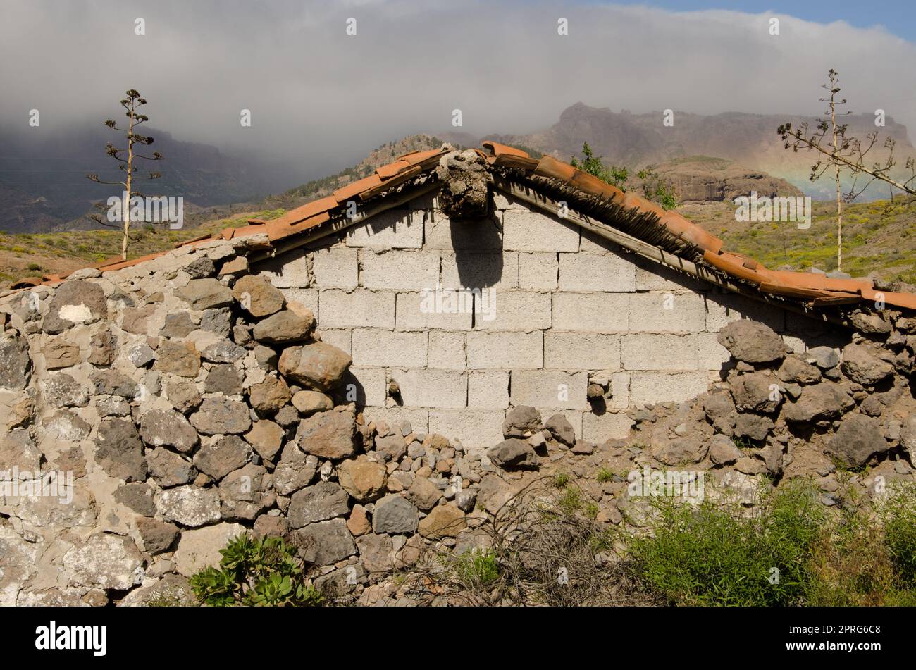 House with one block wall and one collapsed stone wall Stock Photo - Alamy