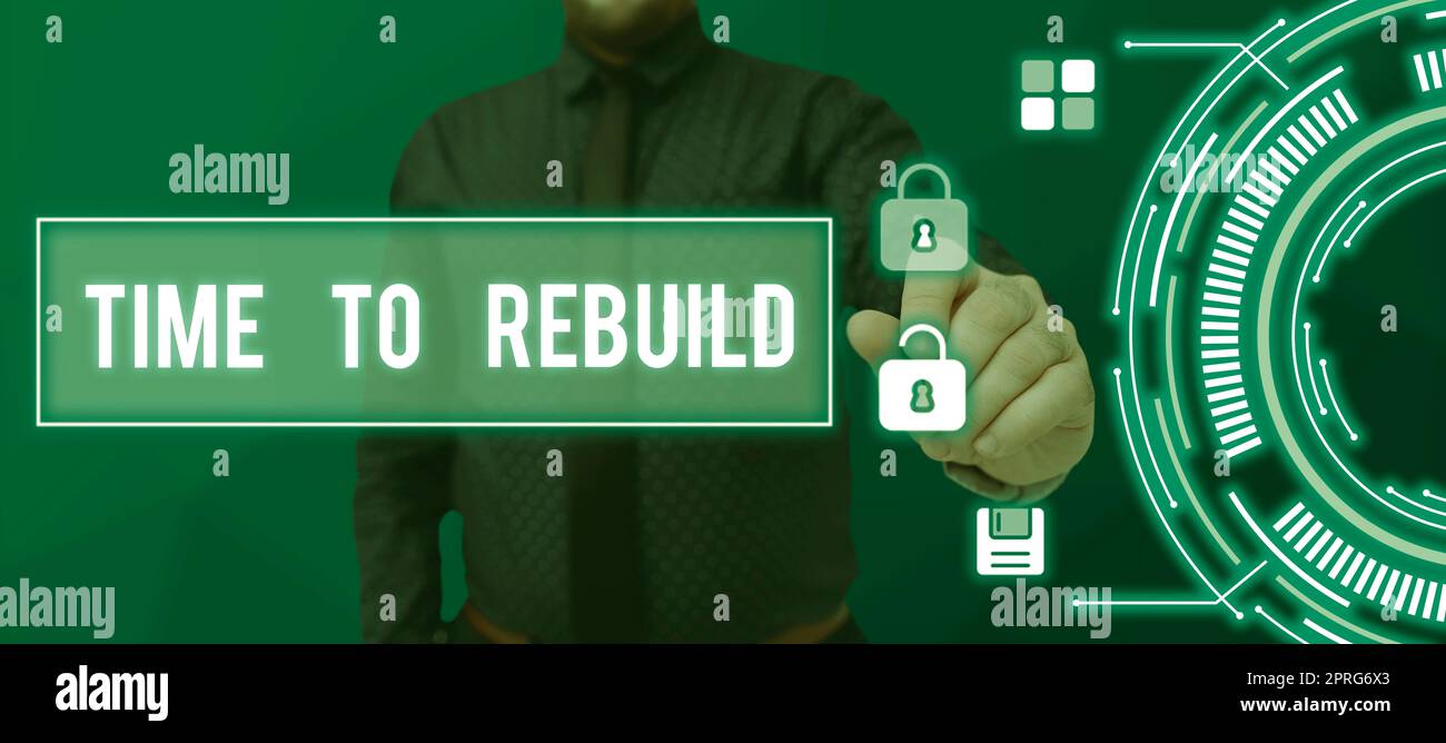 Sign displaying Time To Rebuild. Business overview Right moment to ...