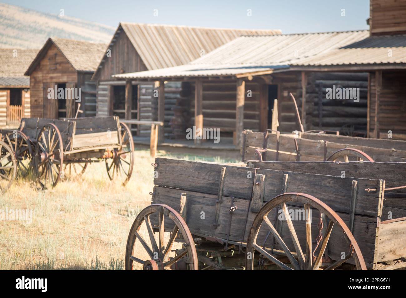 Abstract of Vintage Antique Wood Wagon and Log Cabins Stock Photo - Alamy