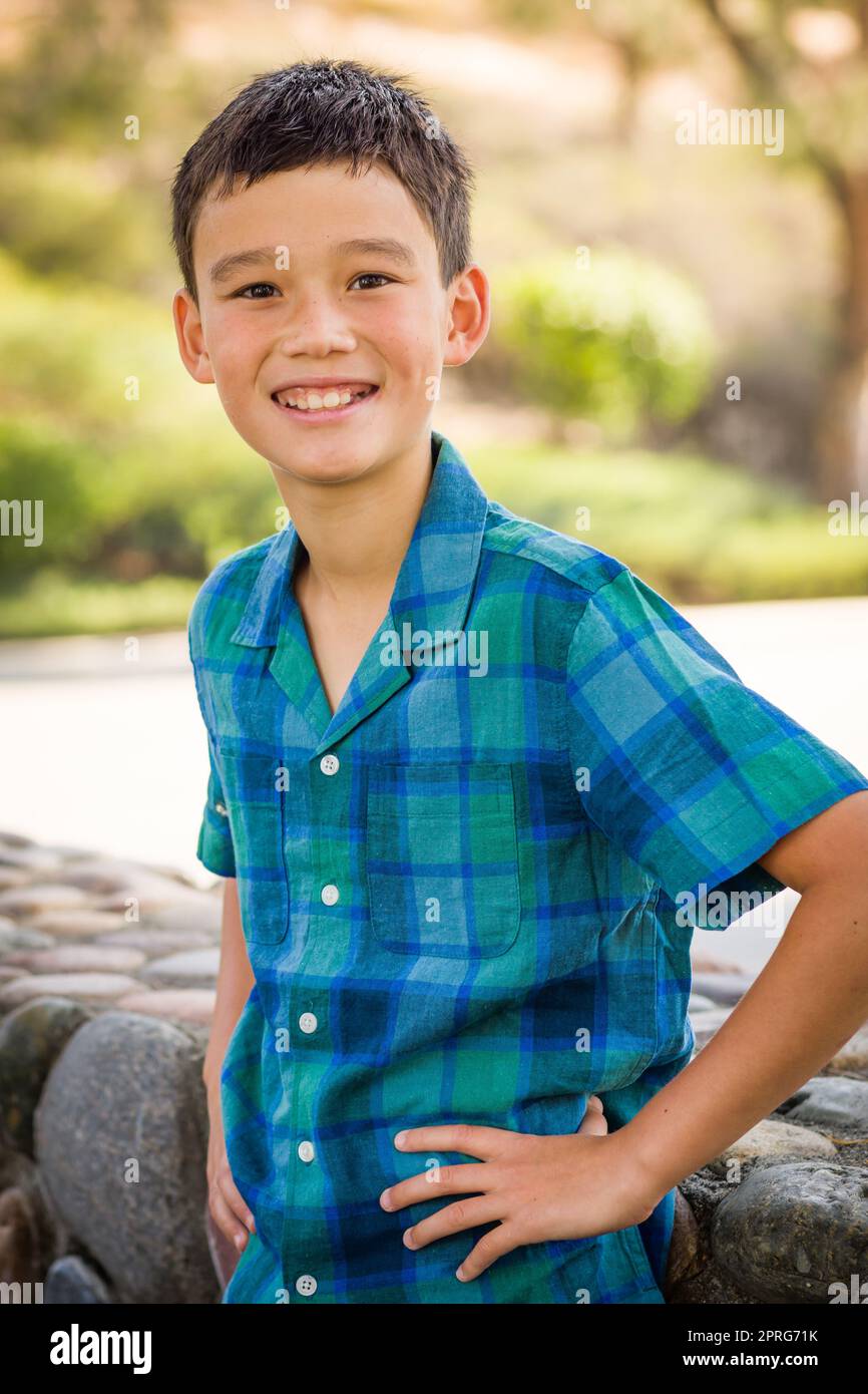 Outdoor portrait of a biracial Chinese and Caucasian boy Stock Photo ...