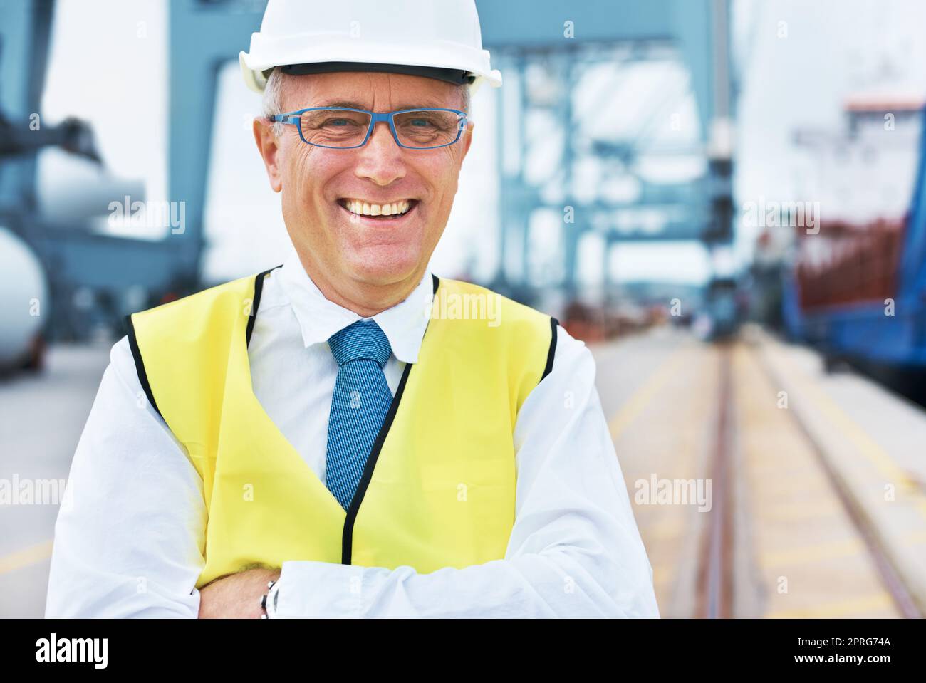 Happy cargo, logistics and shipping manager smile on a port with a ...