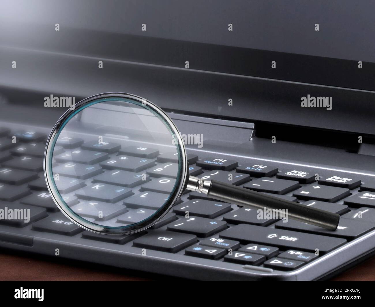 laptop computer with magnifying glass search concept Stock Photo - Alamy