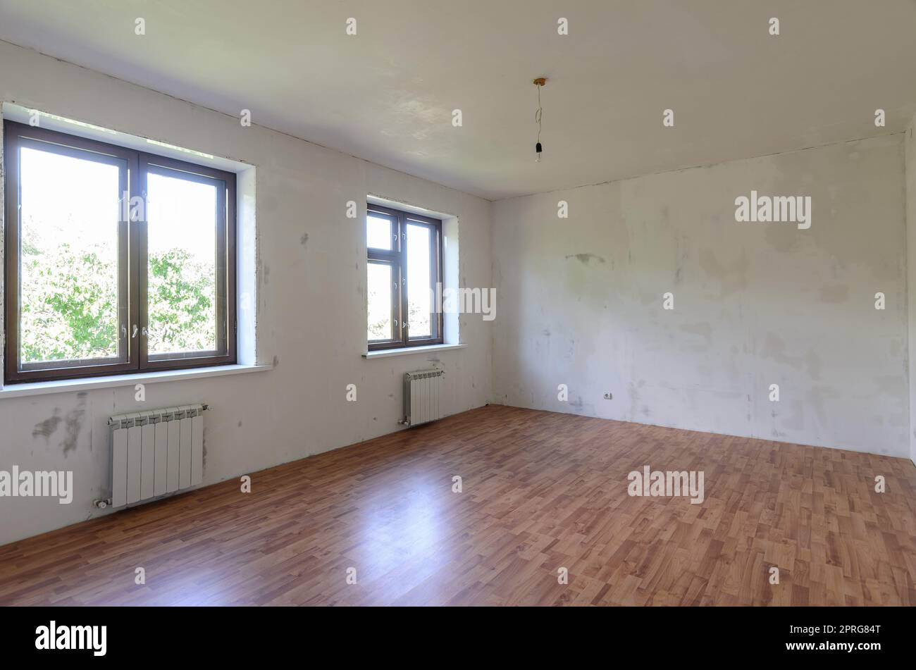 Interior of an empty room during renovation, there are two large ...