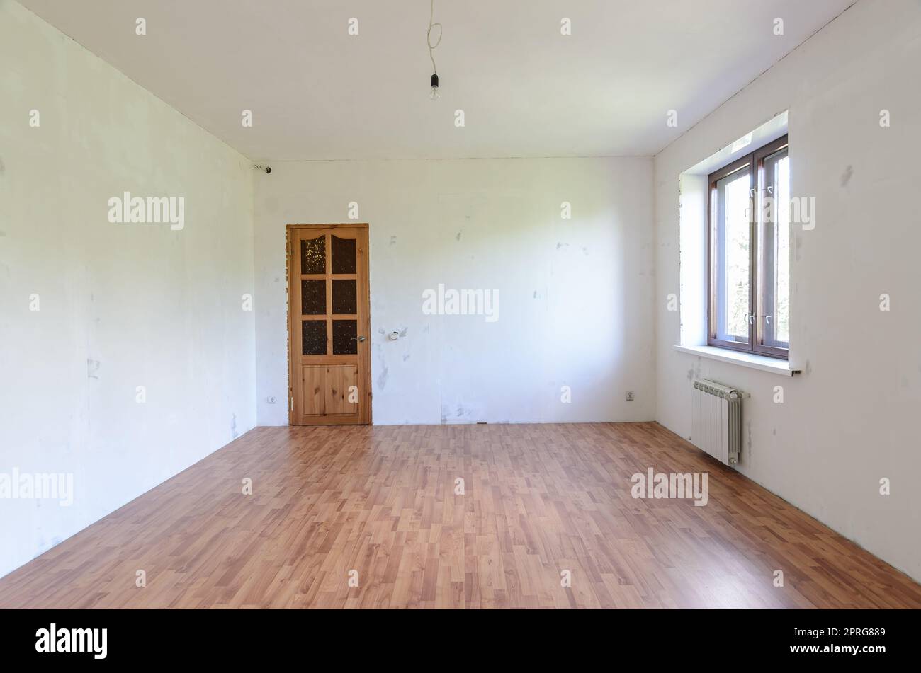 Fragment of a room with a fine finish, view of the front door, there is ...