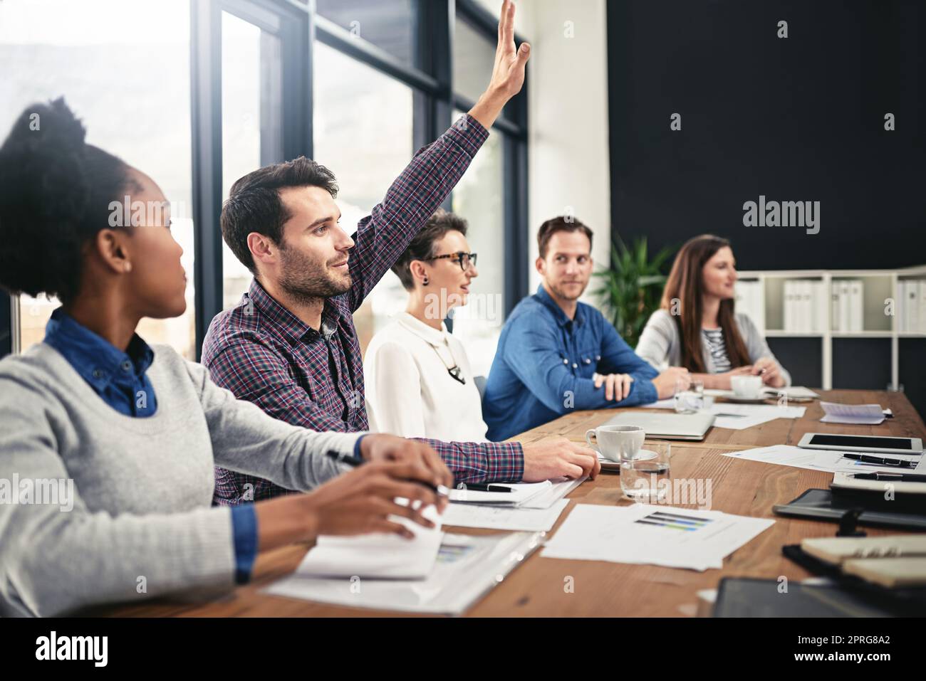 Woman raising hand question hi-res stock photography and images - Alamy