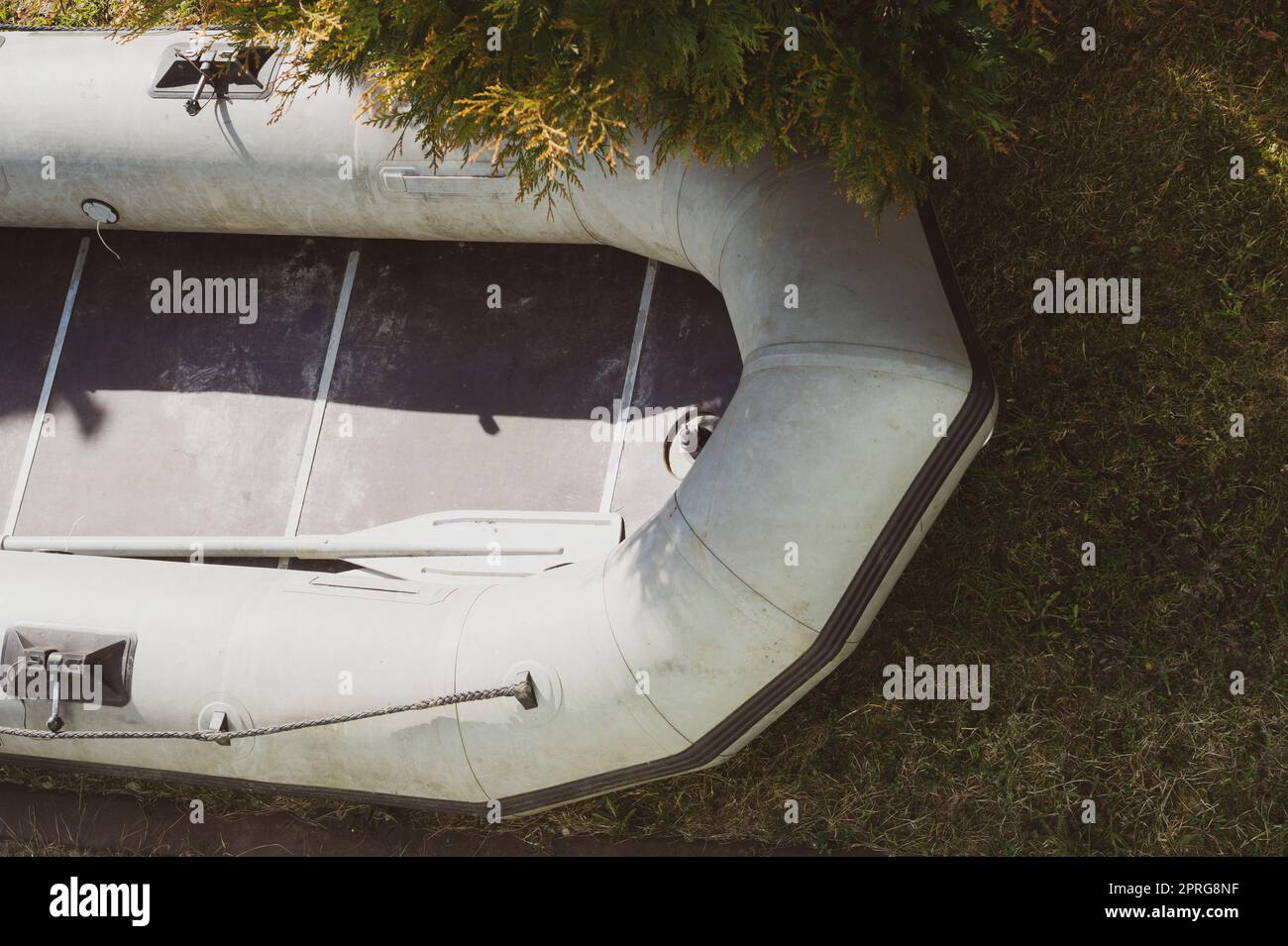 Inflatable boat grass hi-res stock photography and images - Alamy