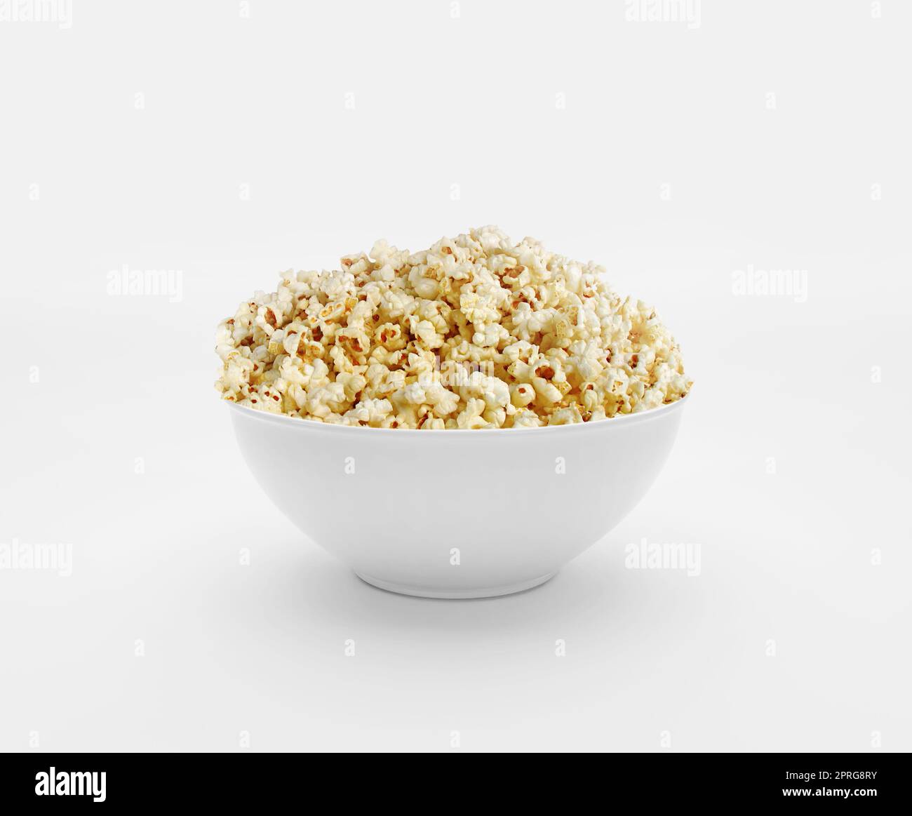 popcorn in bowl isolated on white background Stock Photo - Alamy