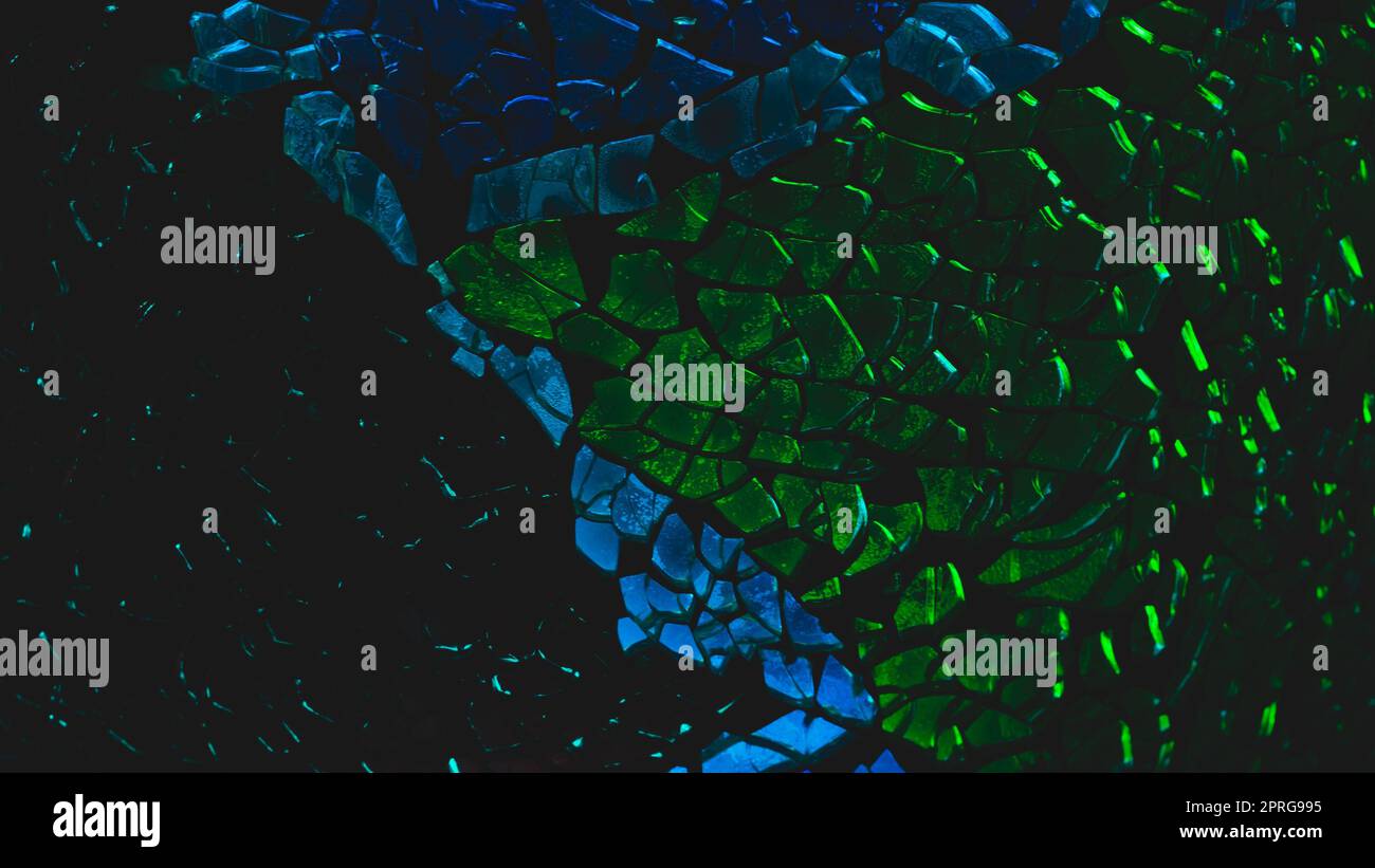 Shattered glass pattern in the dark. abstract cracked background. green ...