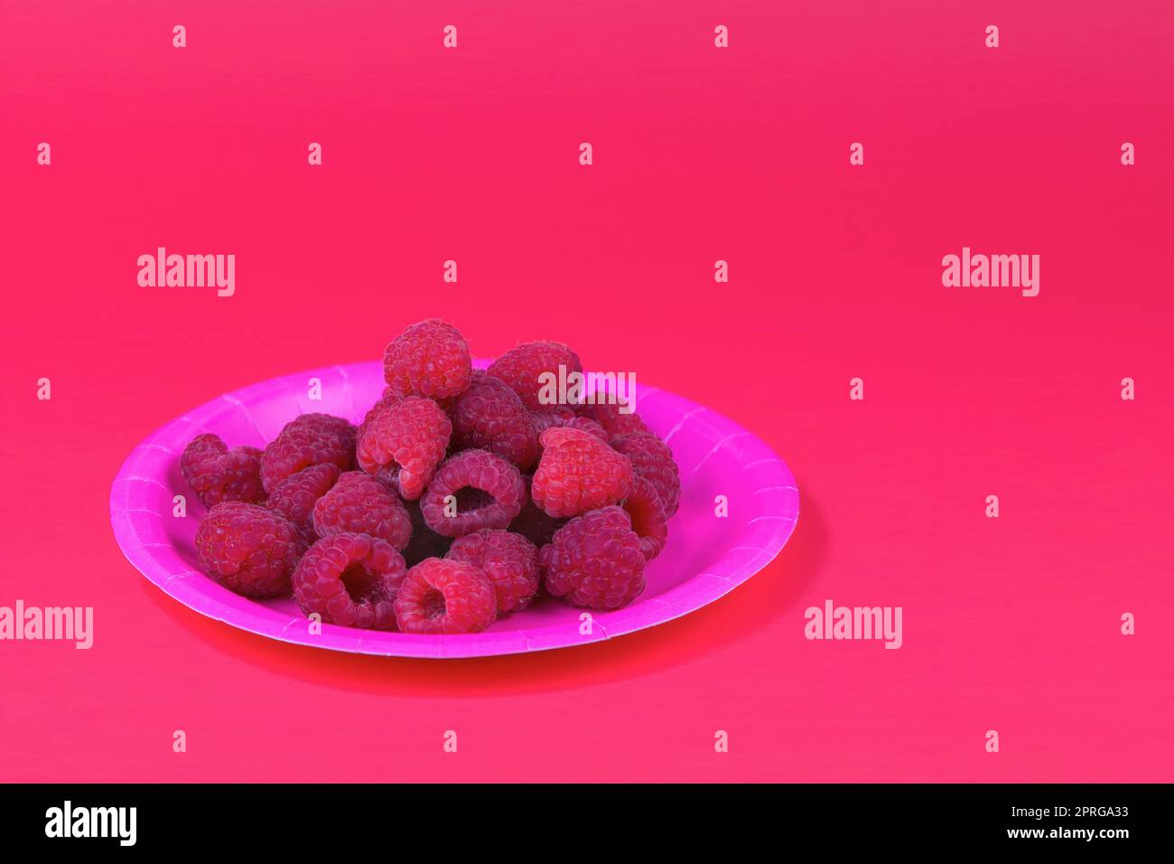 raspberries in pink paper plate fresh organic berries red raspberry ...