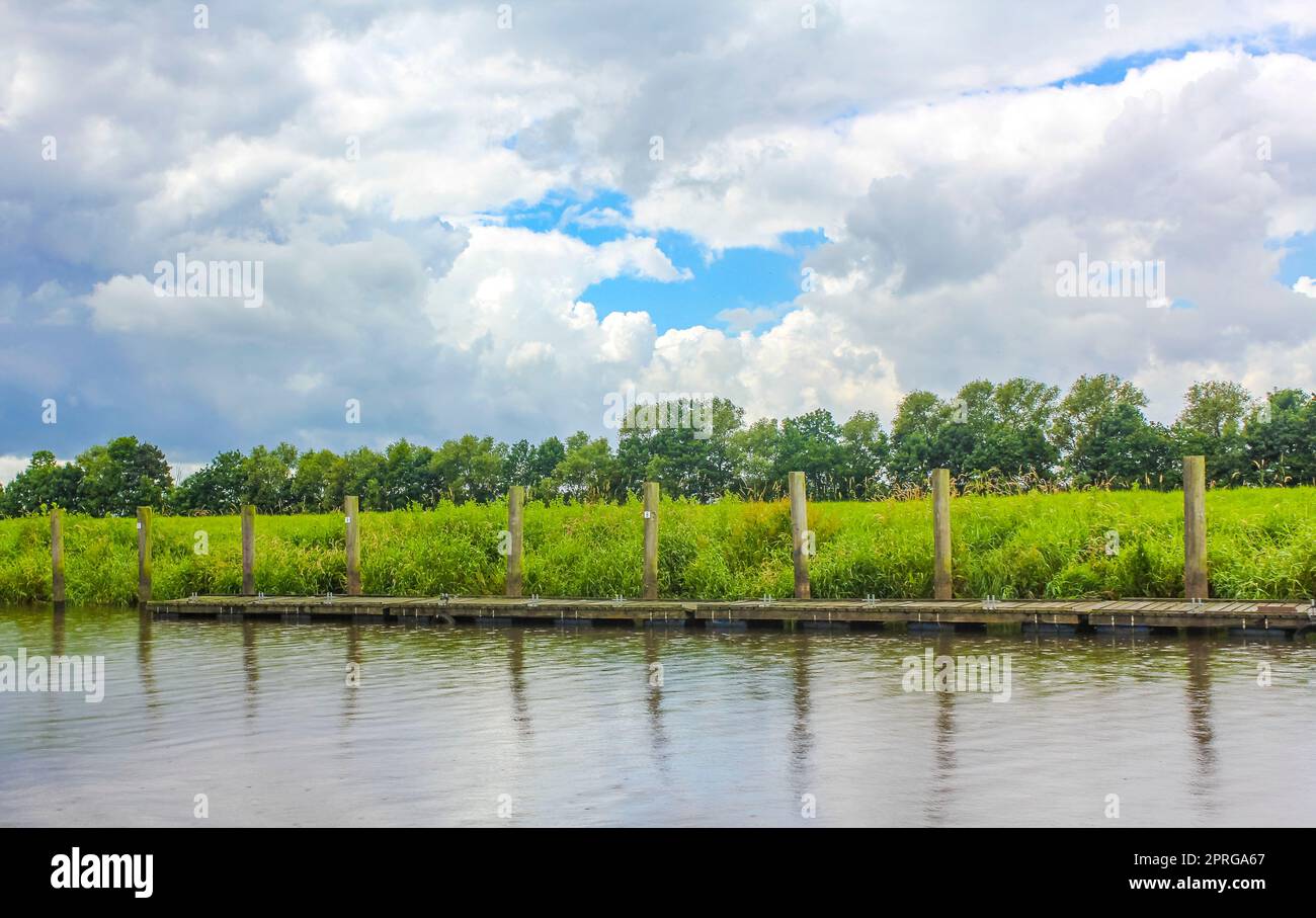 Beautiful natural landscape panorama jetty boat Oste river water ...