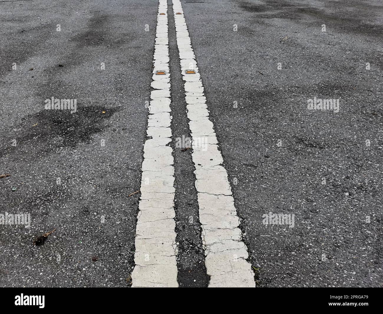 bad road damage of a thailand road Stock Photo - Alamy