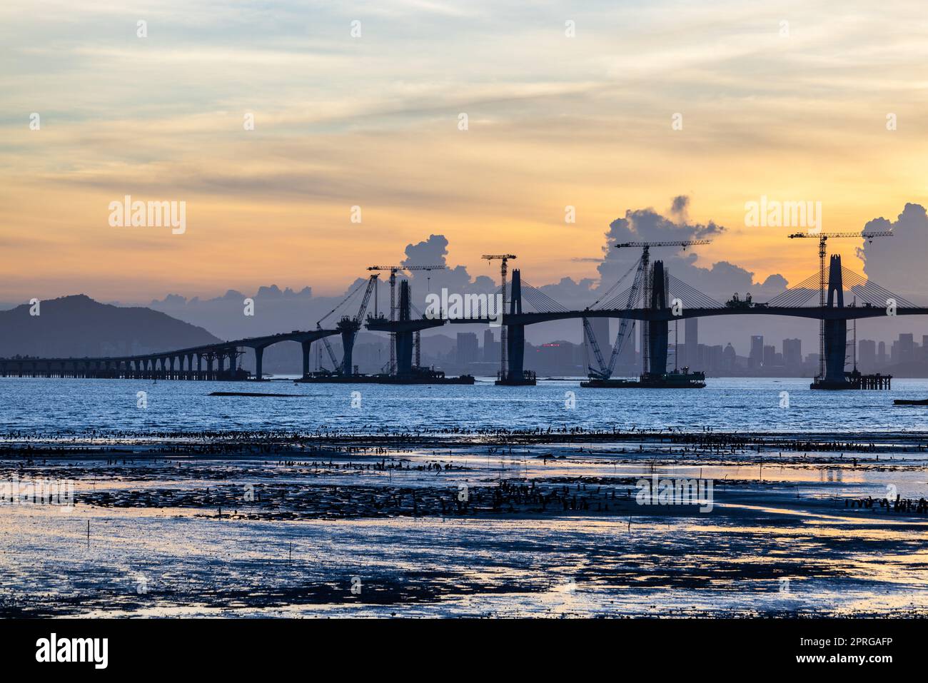 Kinmen Bridge under construction in Taiwan at sunset Stock Photo - Alamy
