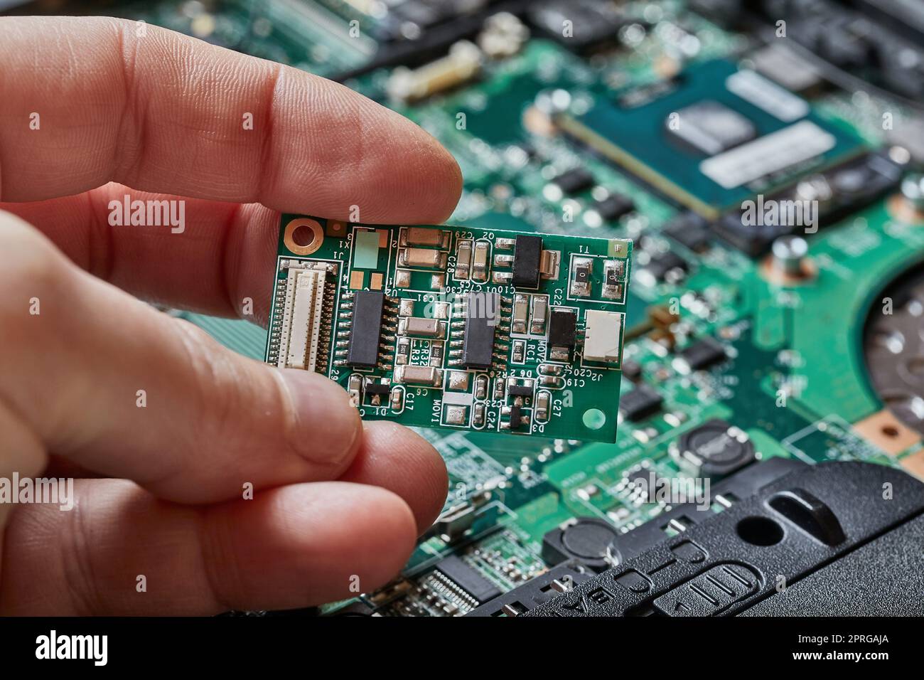 Repairing laptop, changing hardware parts Stock Photo - Alamy