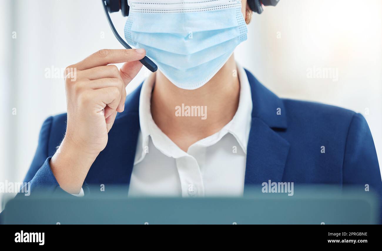 Customer support, crm and covid compliance with face mask and an agent ...