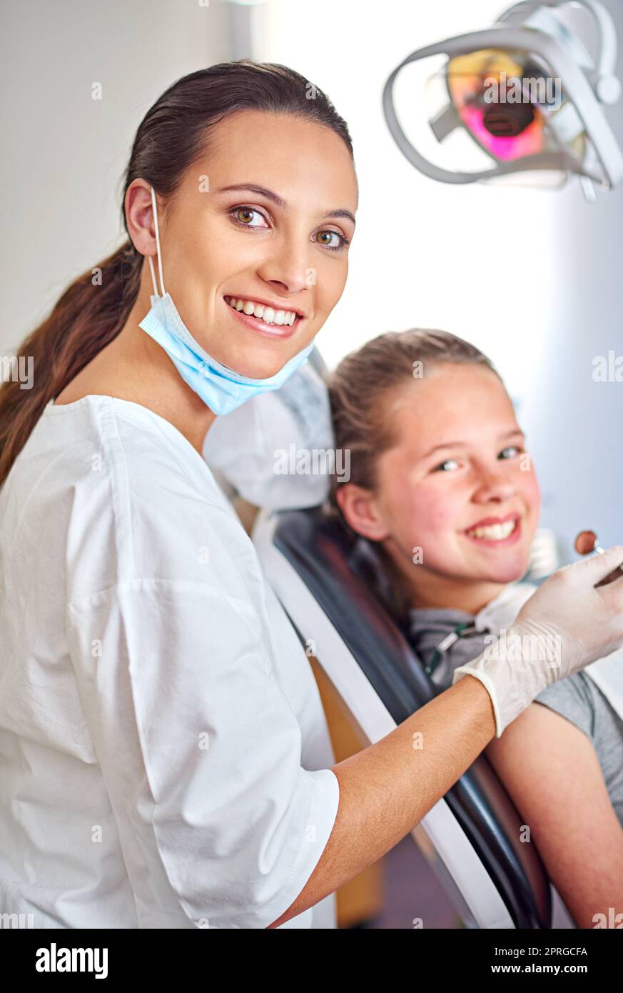 Always professional. Portrait of an attractive female dentist and her ...