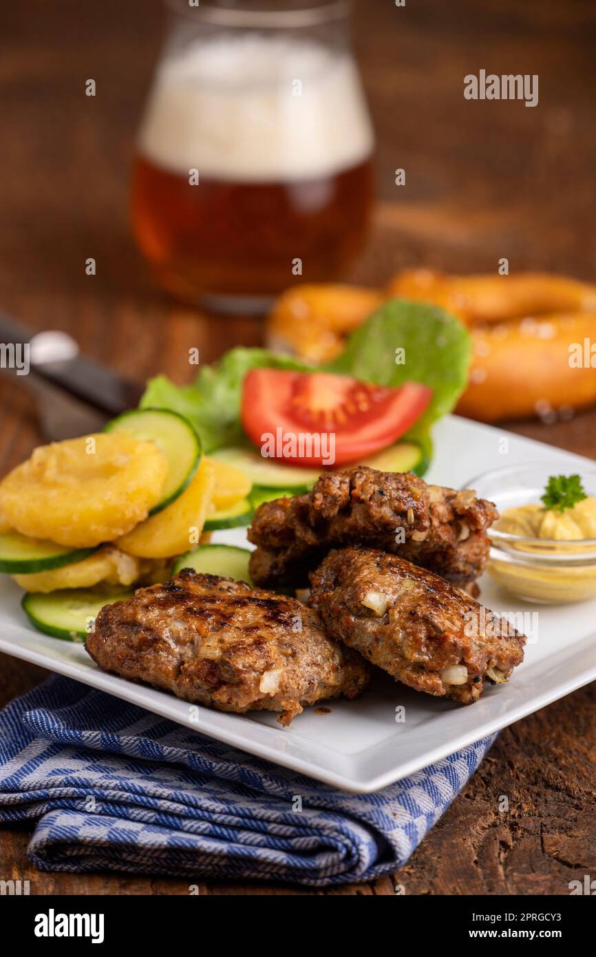 bavarian minced meat fleischpflanzerl Stock Photo - Alamy