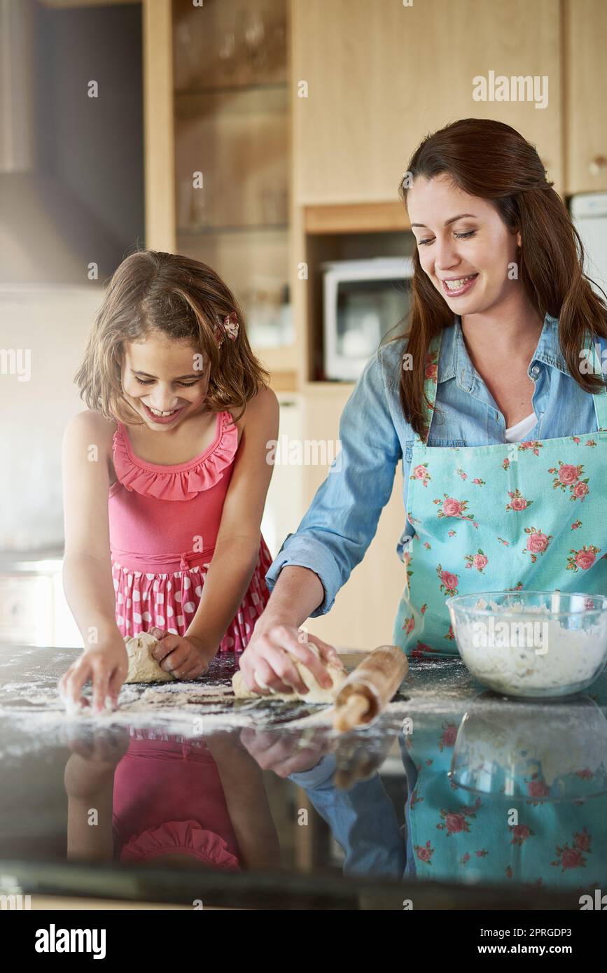 Moms Tried And Tested Favourite A Mother And Her Daughter Having Fun While Baking In The